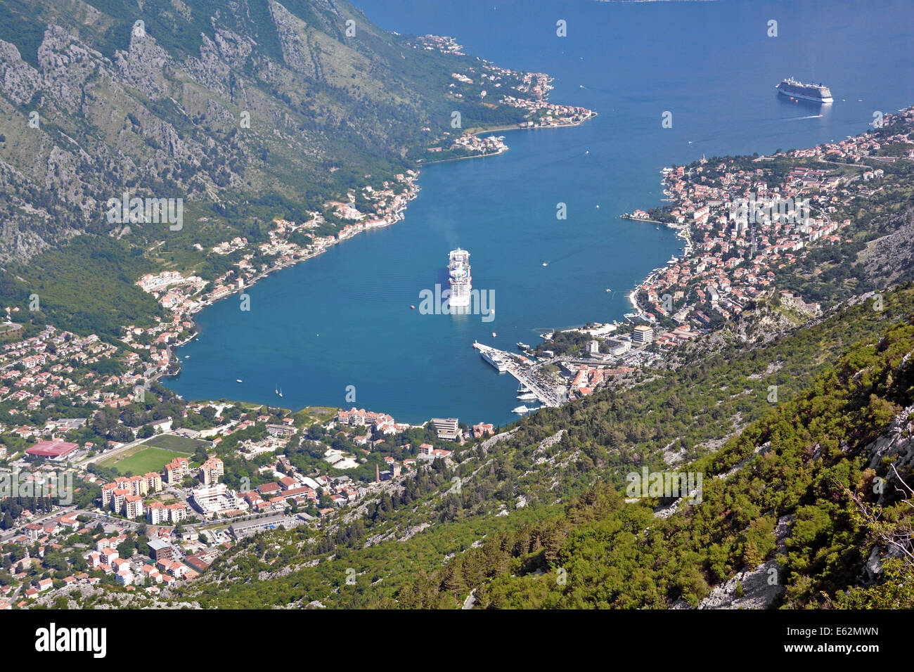 Aerial landscape & view looking down town & Bay of Kotor cruise ships ...