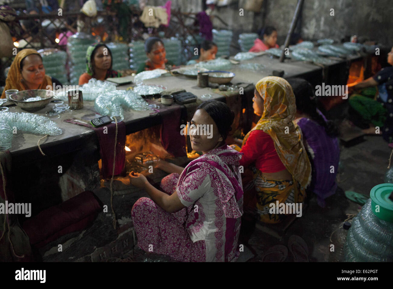 Women work with hazardous condition in a bangle factory near Dhaka ...