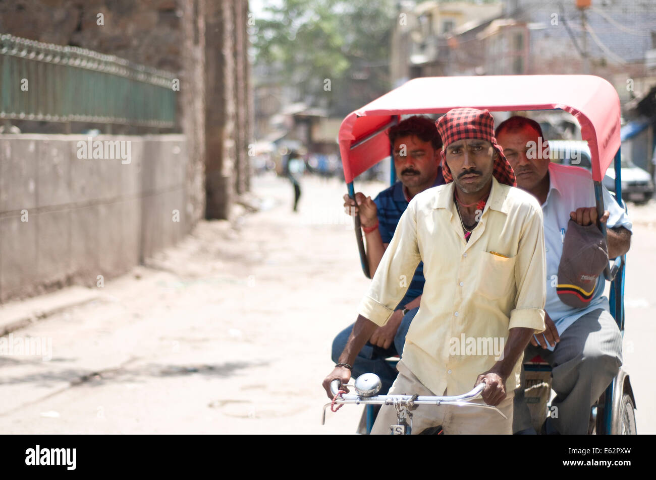 Cycle rickshaw taxi rides in Delhi, India Stock Photo - Alamy
