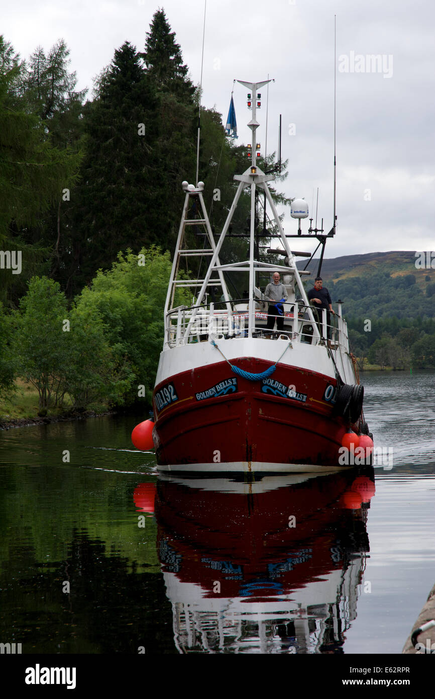 A trawler traversing the Caledonian Canal to Inverness Stock Photo - Alamy