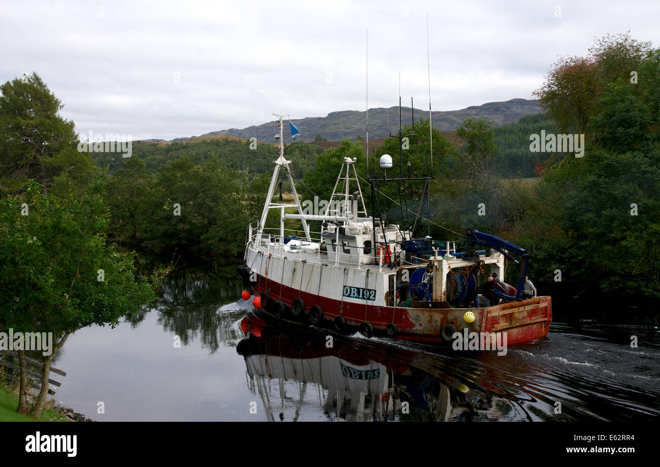 A trawler traversing the Caledonian Canal to Inverness Stock Photo - Alamy
