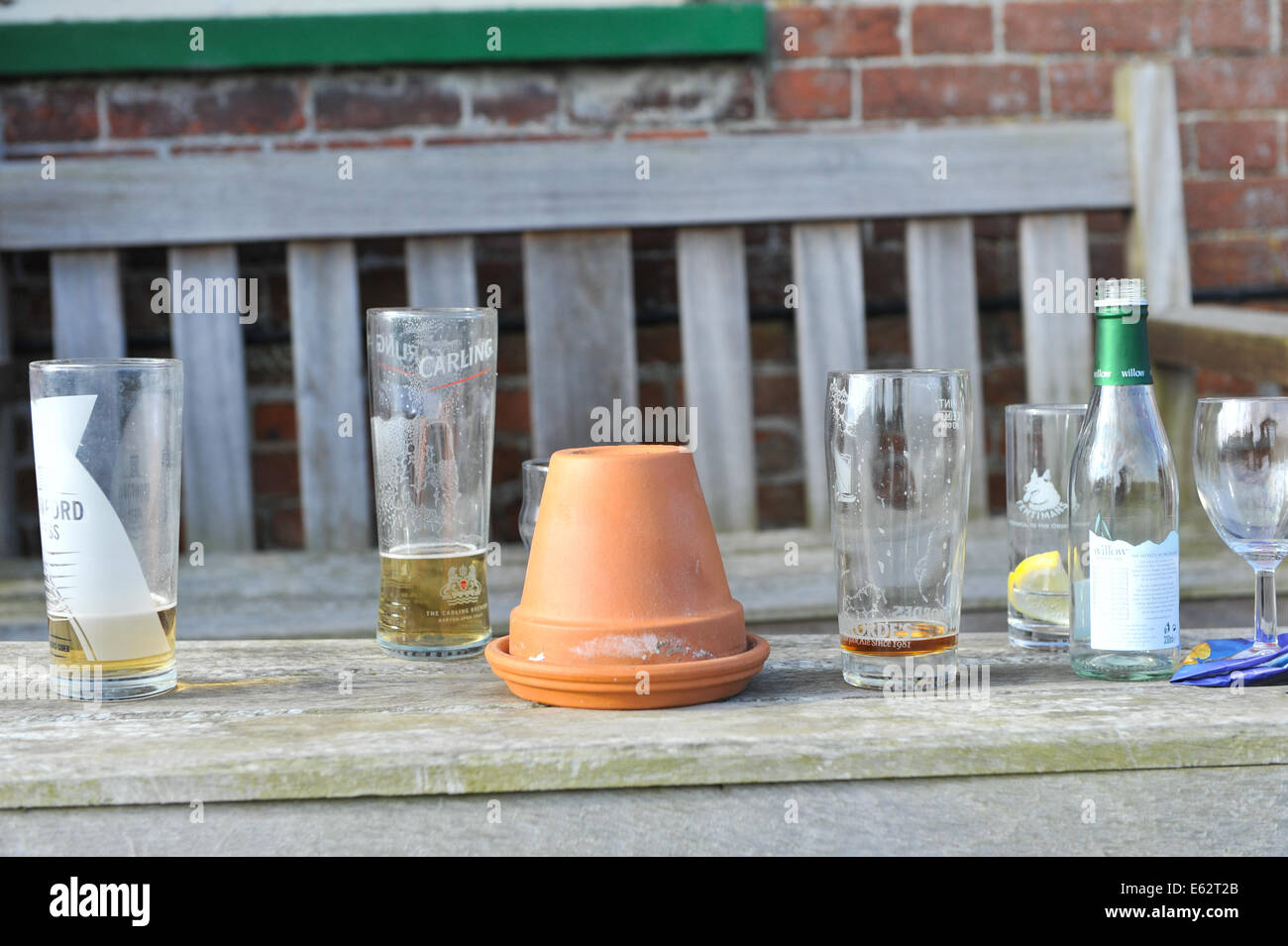 Beer glass on table outside pub empties drinking alcohol hi-res stock ...