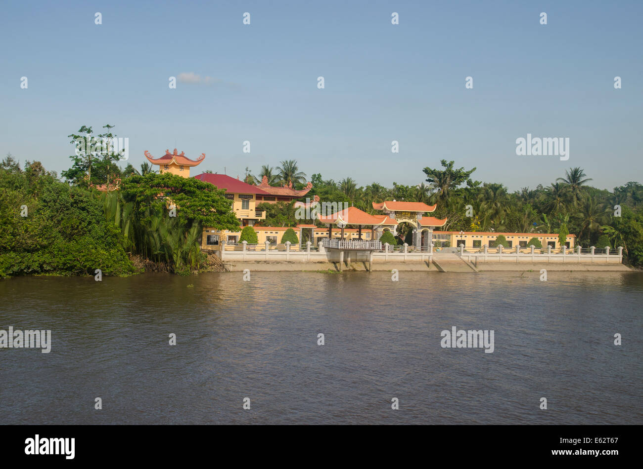 Temple on the banks of a river in the Mekong delta Stock Photo - Alamy