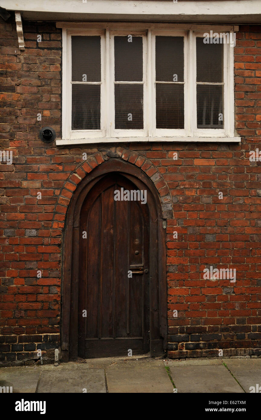 Arched doorway and window, Dorking. Surrey England Stock Photo - Alamy