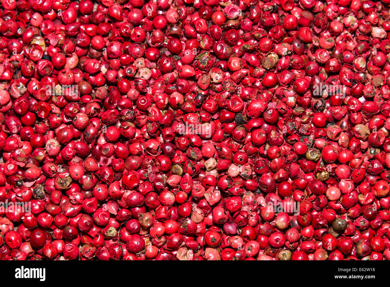 Red pepper seeds as background Stock Photo - Alamy