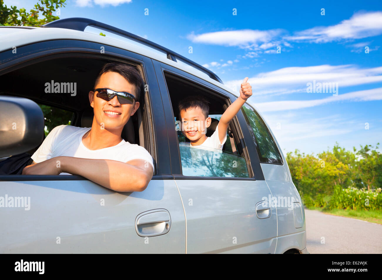 happy little boy with father sitting in the car Stock Photo - Alamy