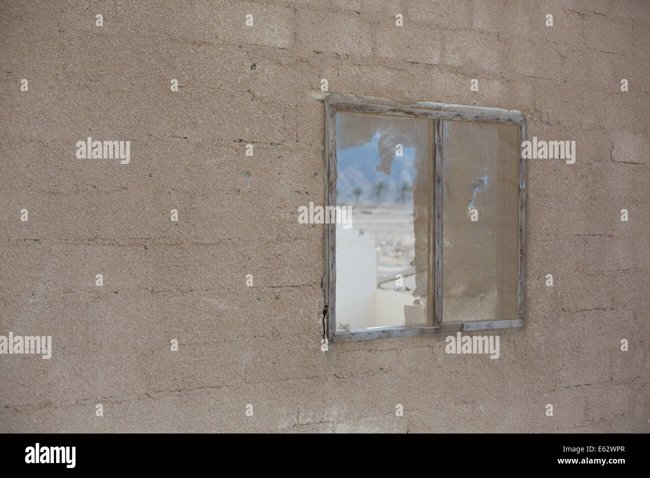 Desert view through a broken window, Dibba, UAE Stock Photo - Alamy