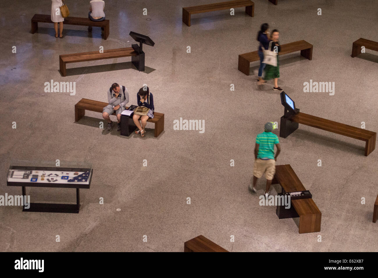 National 9/11 Museum, Manhattan, New York. People resting on benches in ...