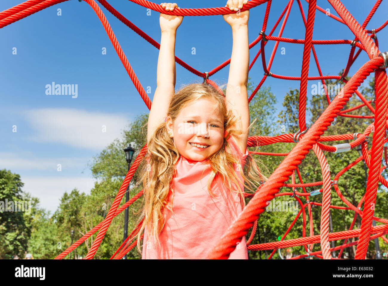Child on rope net hi-res stock photography and images - Alamy