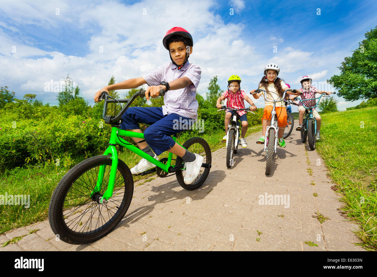 Black friends biking hi-res stock photography and images - Alamy