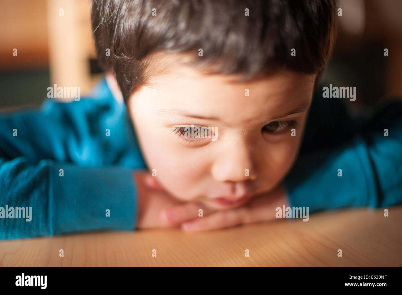 A young boy is sad Stock Photo - Alamy
