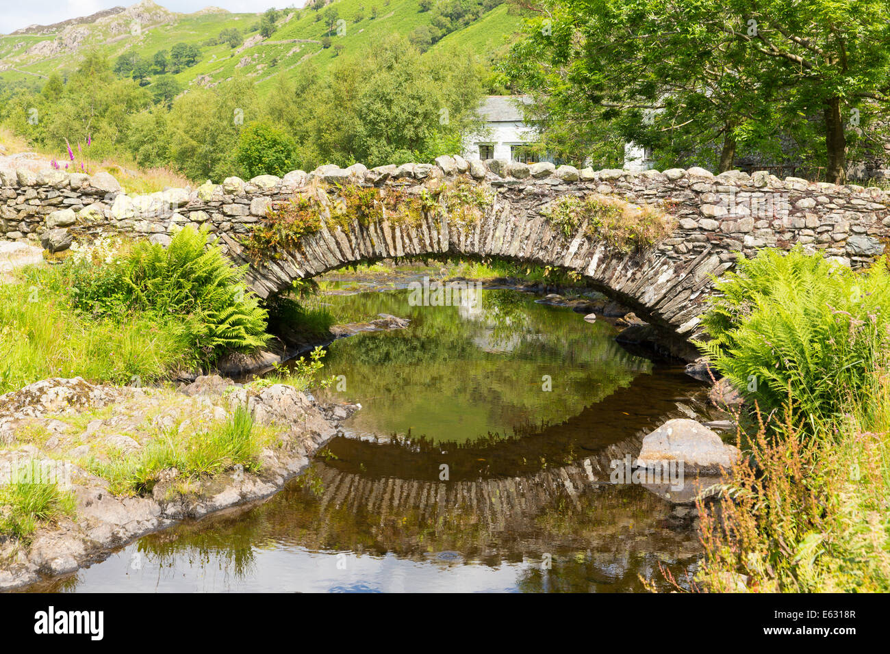 Packhorse bridge Watendlath Tarn Lake District Cumbria England between ...