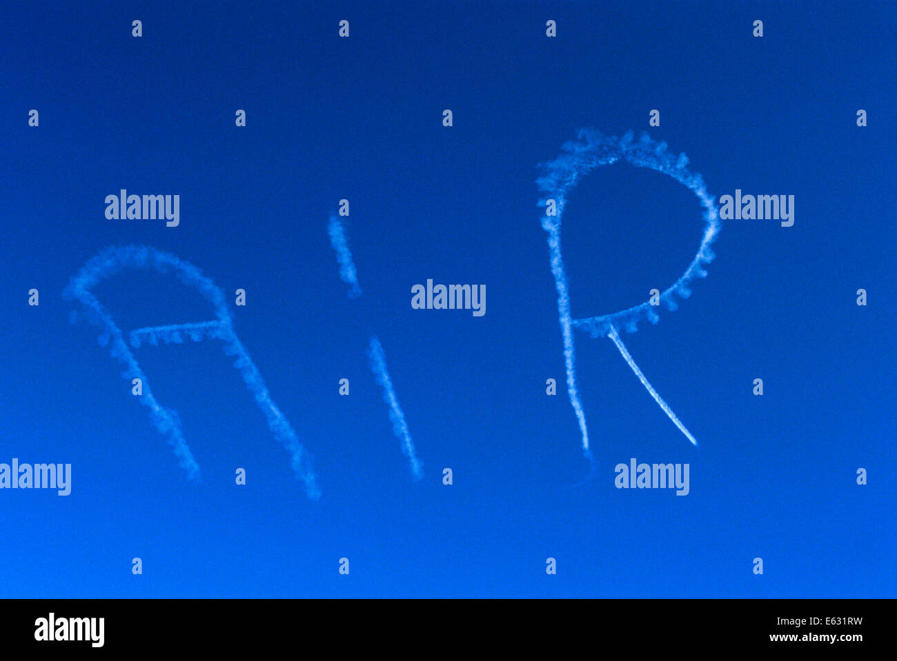 SKYWRITING THE LETTERS AIR IN CLOUDLESS BLUE SKY Stock Photo - Alamy