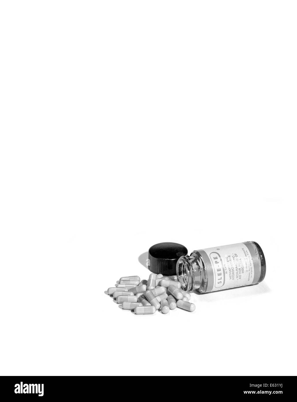 White pills capsules bottle Black and White Stock Photos & Images - Alamy