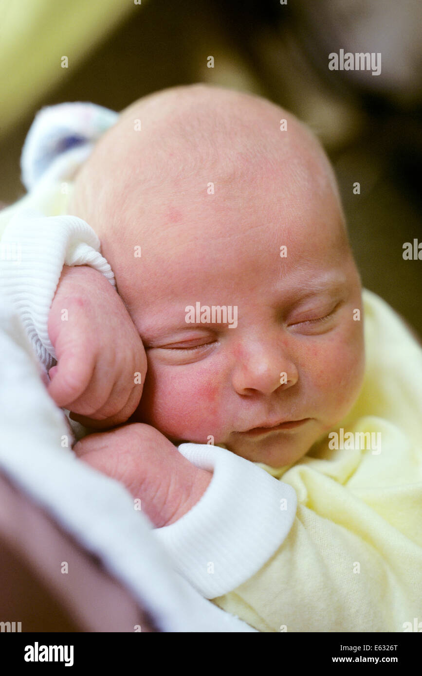 SLEEPING BABY HEAD AND HANDS CLOSE -UP Stock Photo - Alamy