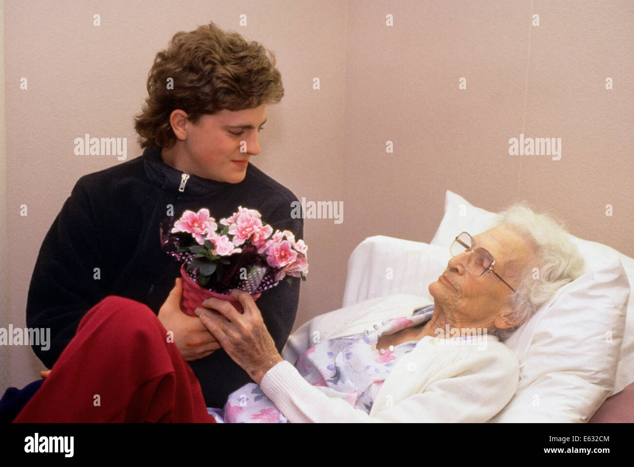 Family visits grandparent in hospital hi-res stock photography and ...