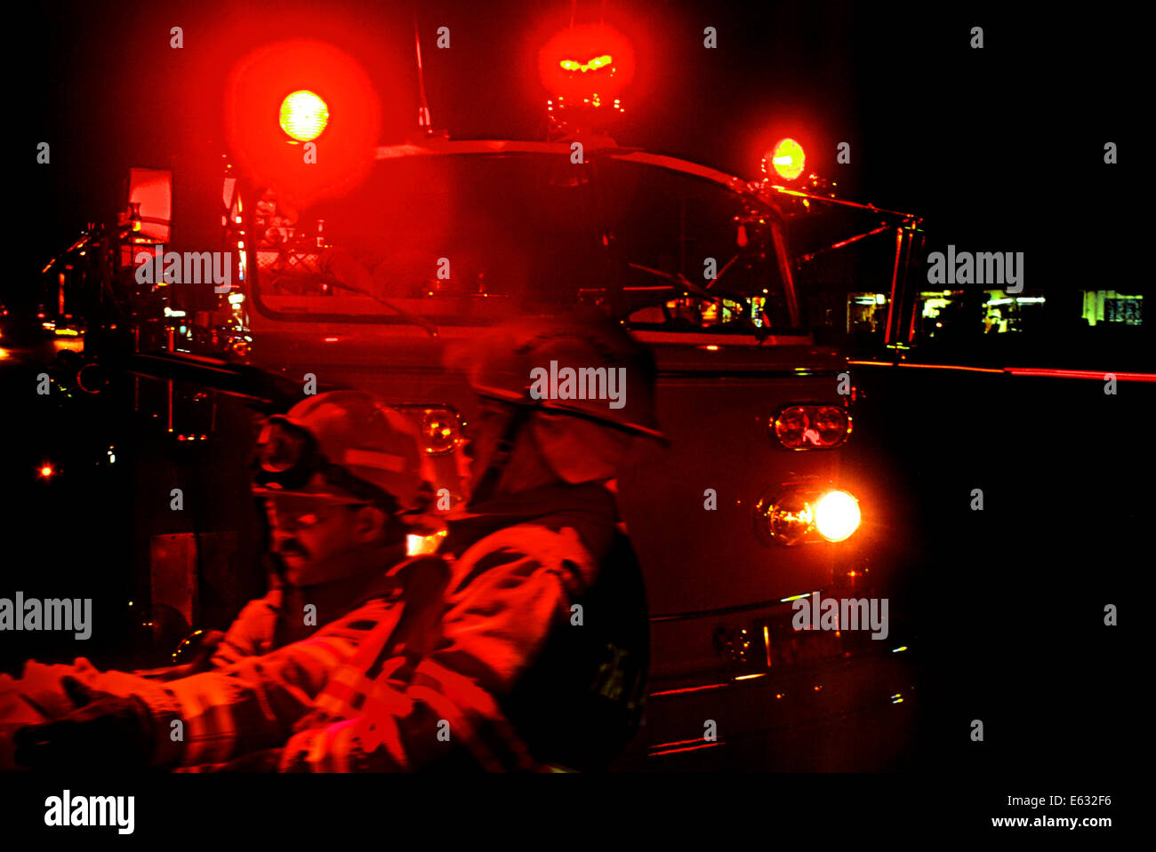 1990s FIREFIGHTER AND EMT WORKING ON PATIENT Stock Photo - Alamy