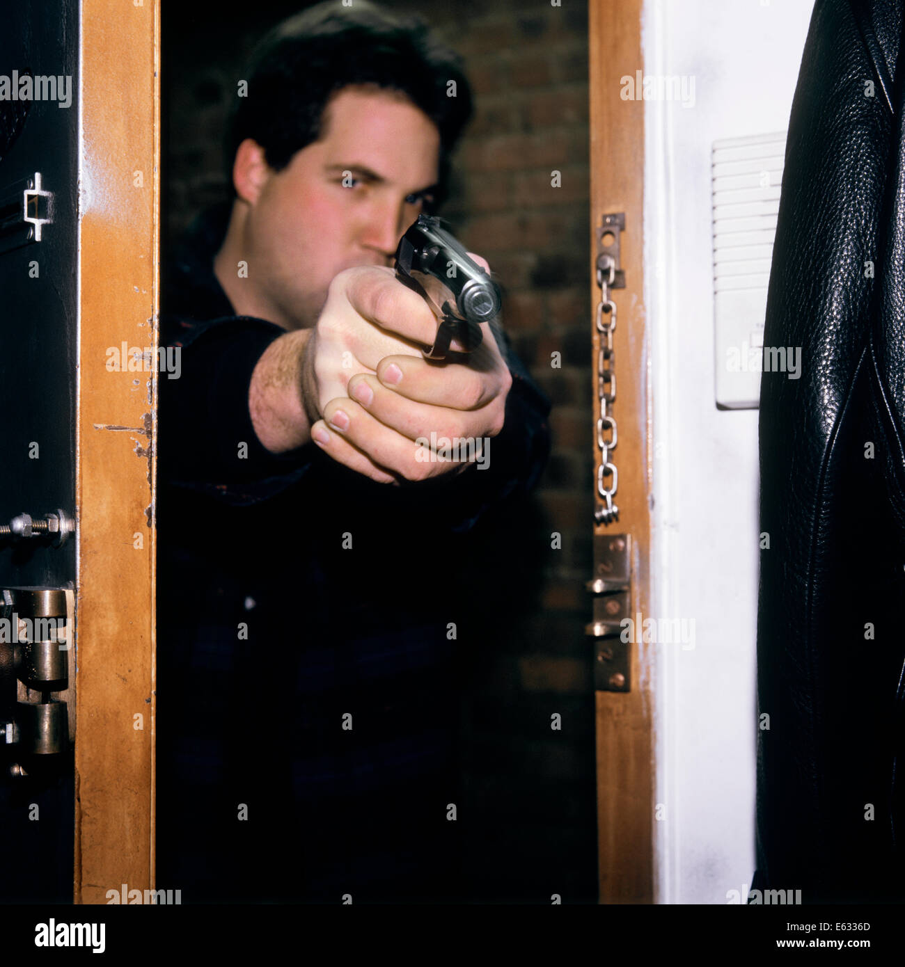 Man pointing gun at camera hi-res stock photography and images - Alamy