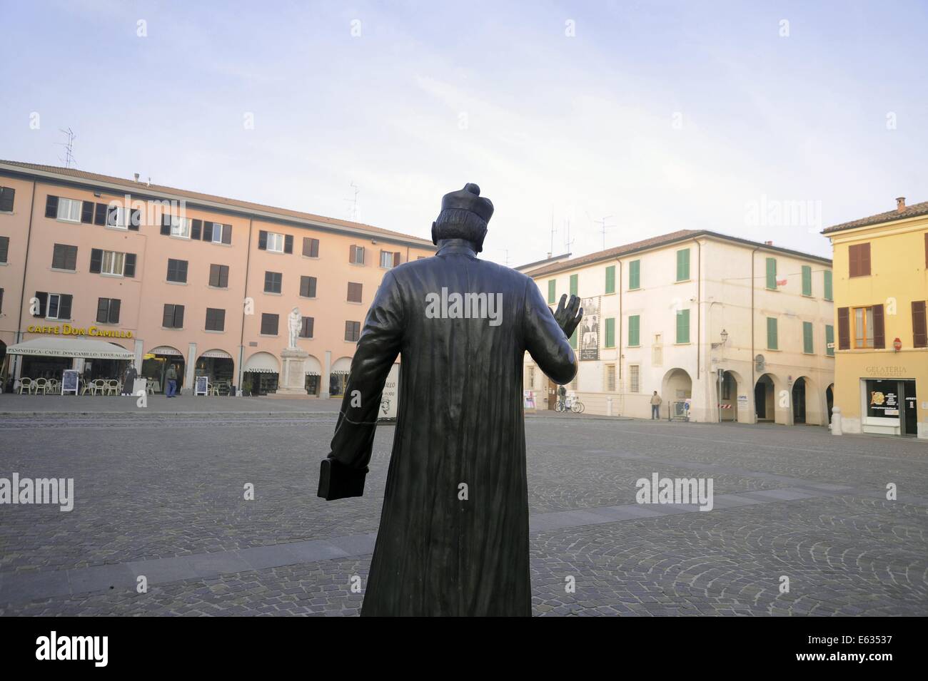 Brescello (Reggio Emilia, Italy), the statue of Don Camillo, in front ...