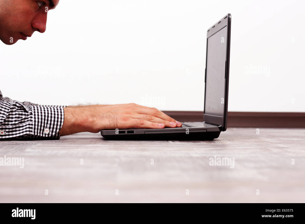 Image of a man using laptop Stock Photo - Alamy