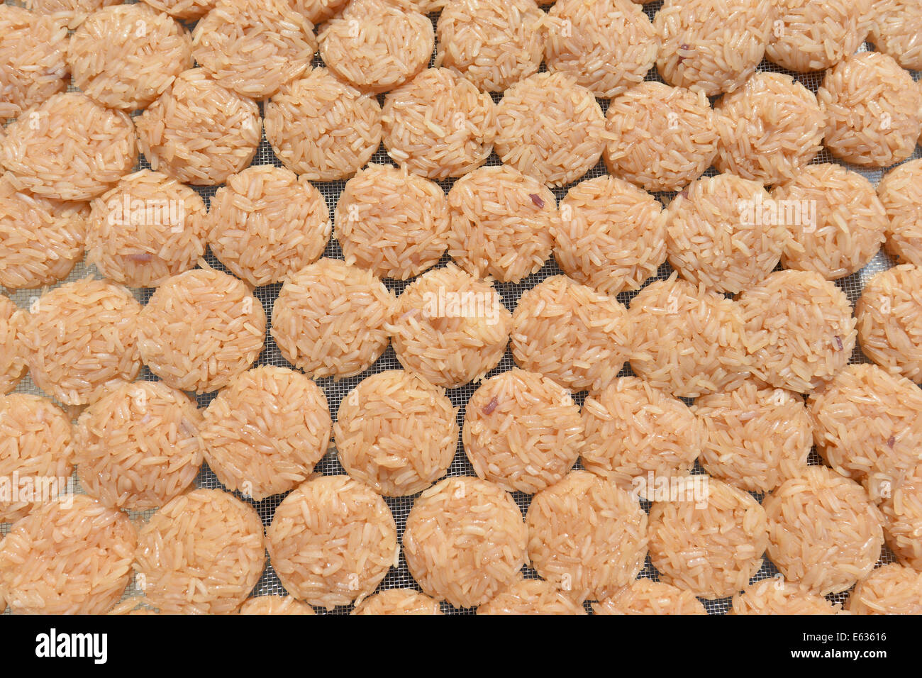 Deep-fried rice cakes drizzled with palm sugar in Lampang, Thailand ...