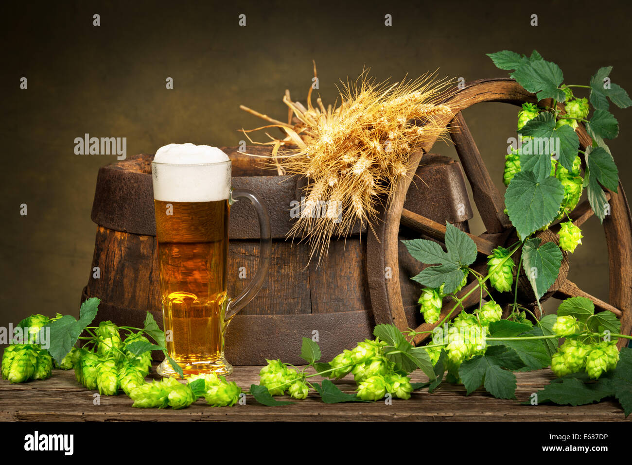 glass of beer with raw material for beer production Stock Photo - Alamy