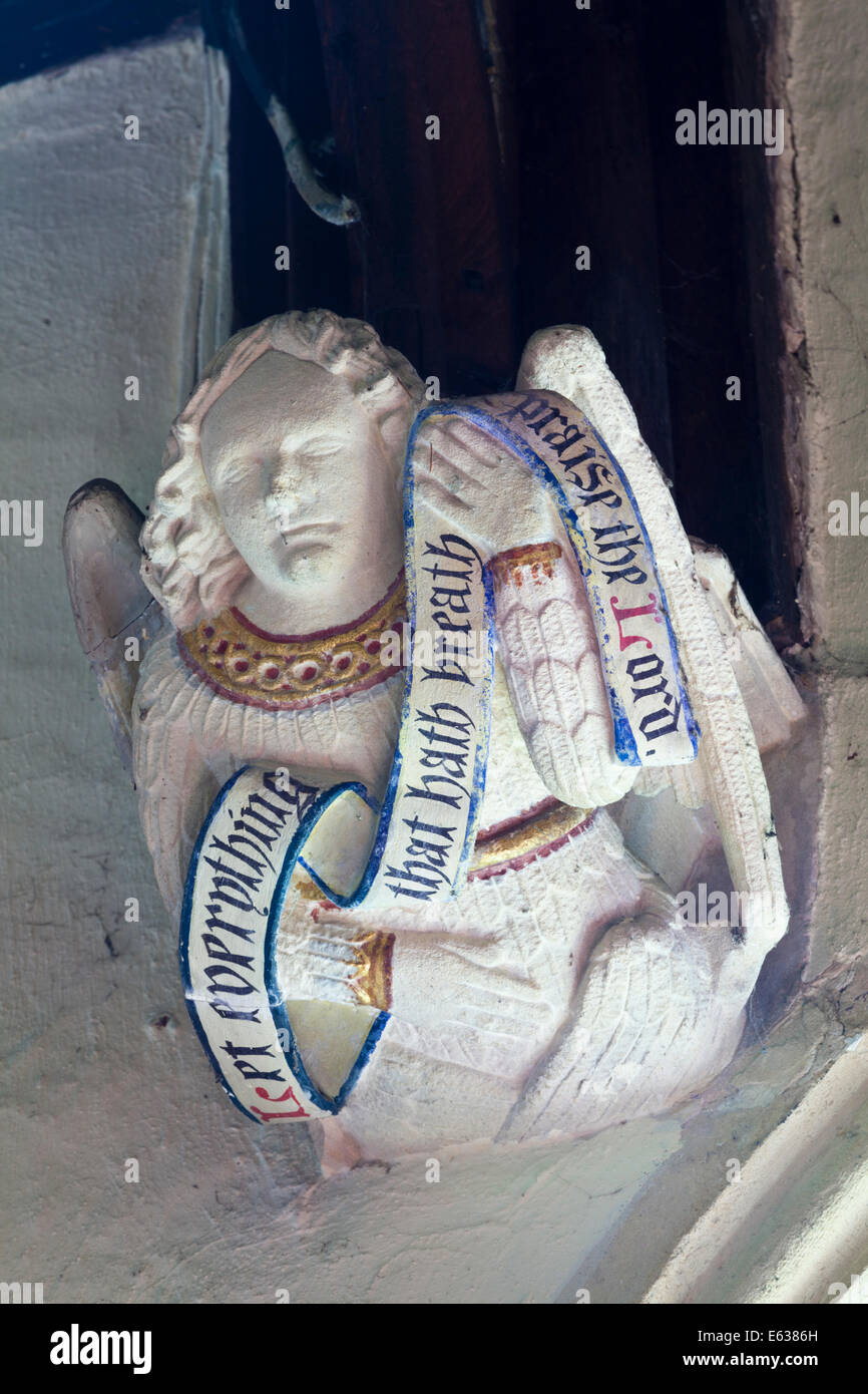 A corbel in St Peters church in the Cotswold village of Rendcomb ...