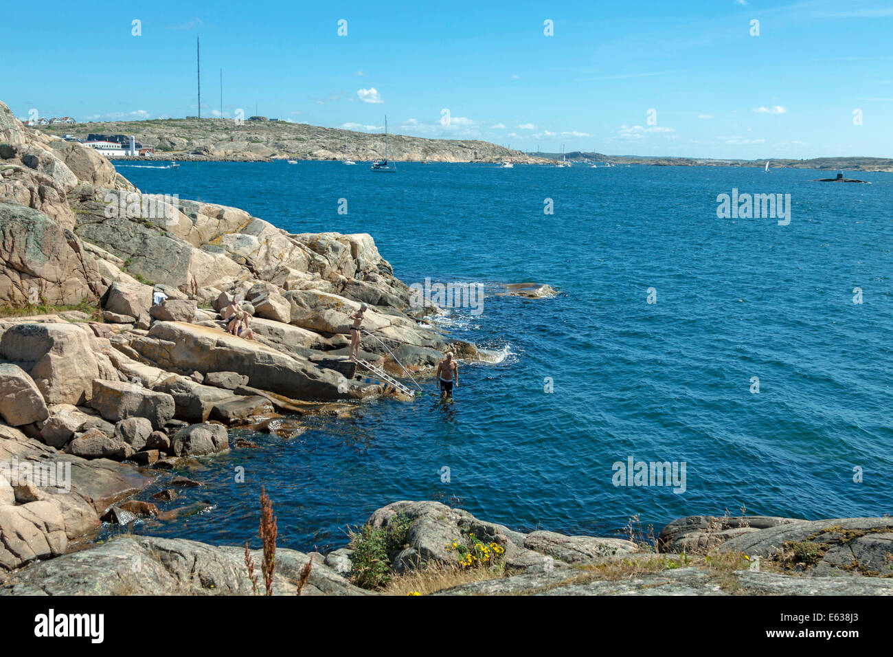 Swimming and sunbathing on the rocks of the Swedish Archipelago at ...