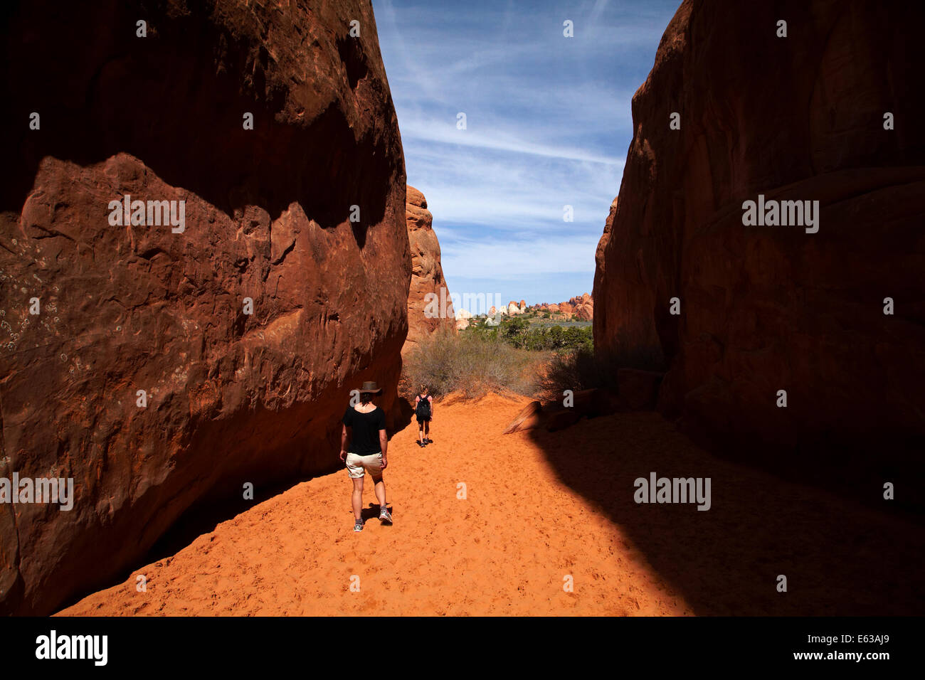 Walking on sandy path people hi-res stock photography and images - Alamy