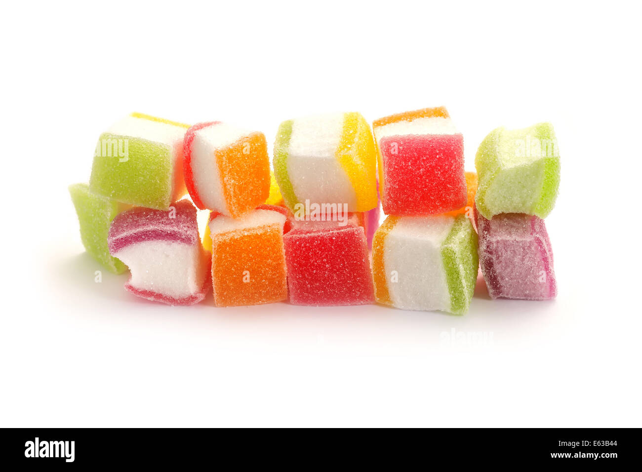 Stack of candies on white background Stock Photo - Alamy