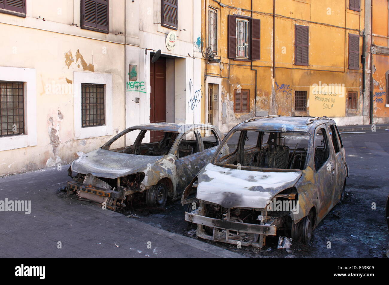 ROME - OCTOBER 15: Devastation of cars by black block groups during the ...