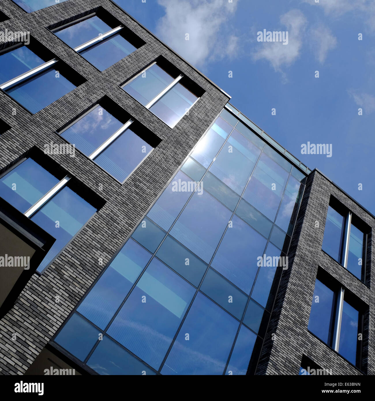 sky reflected in office building windows Stock Photo - Alamy