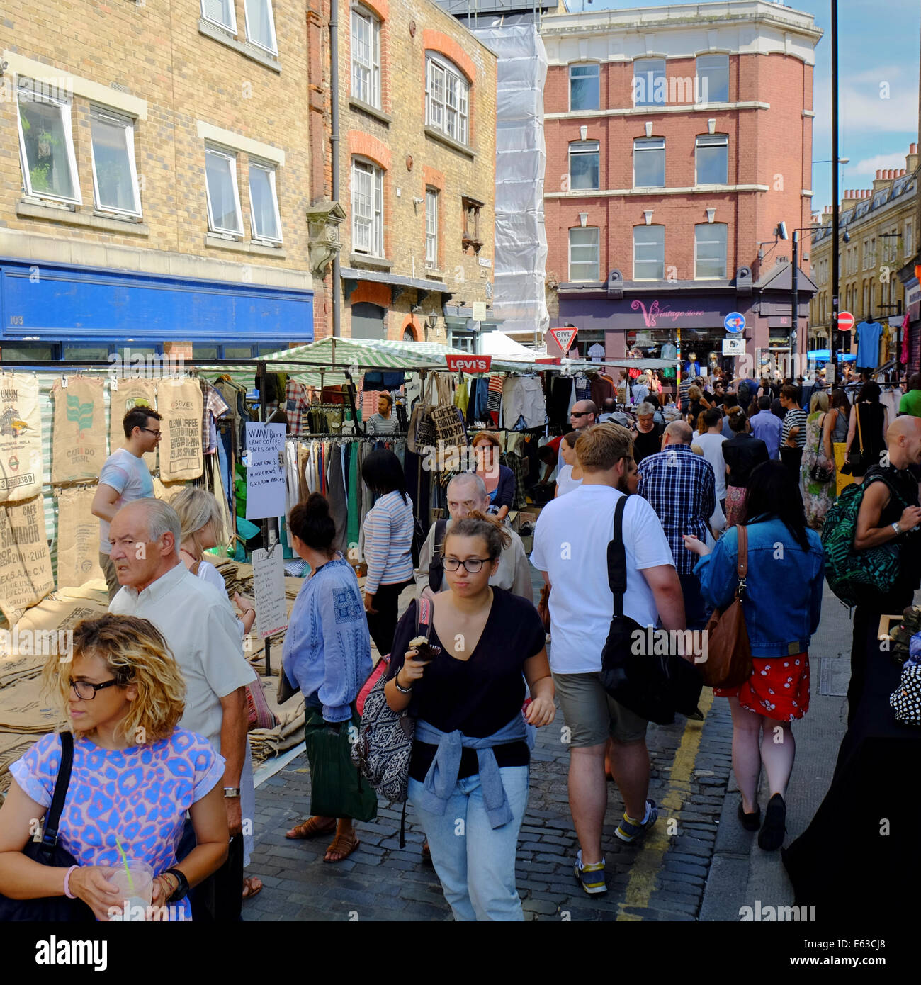 Crowded street market near Brick Lane in Shoreditch, London, England ...