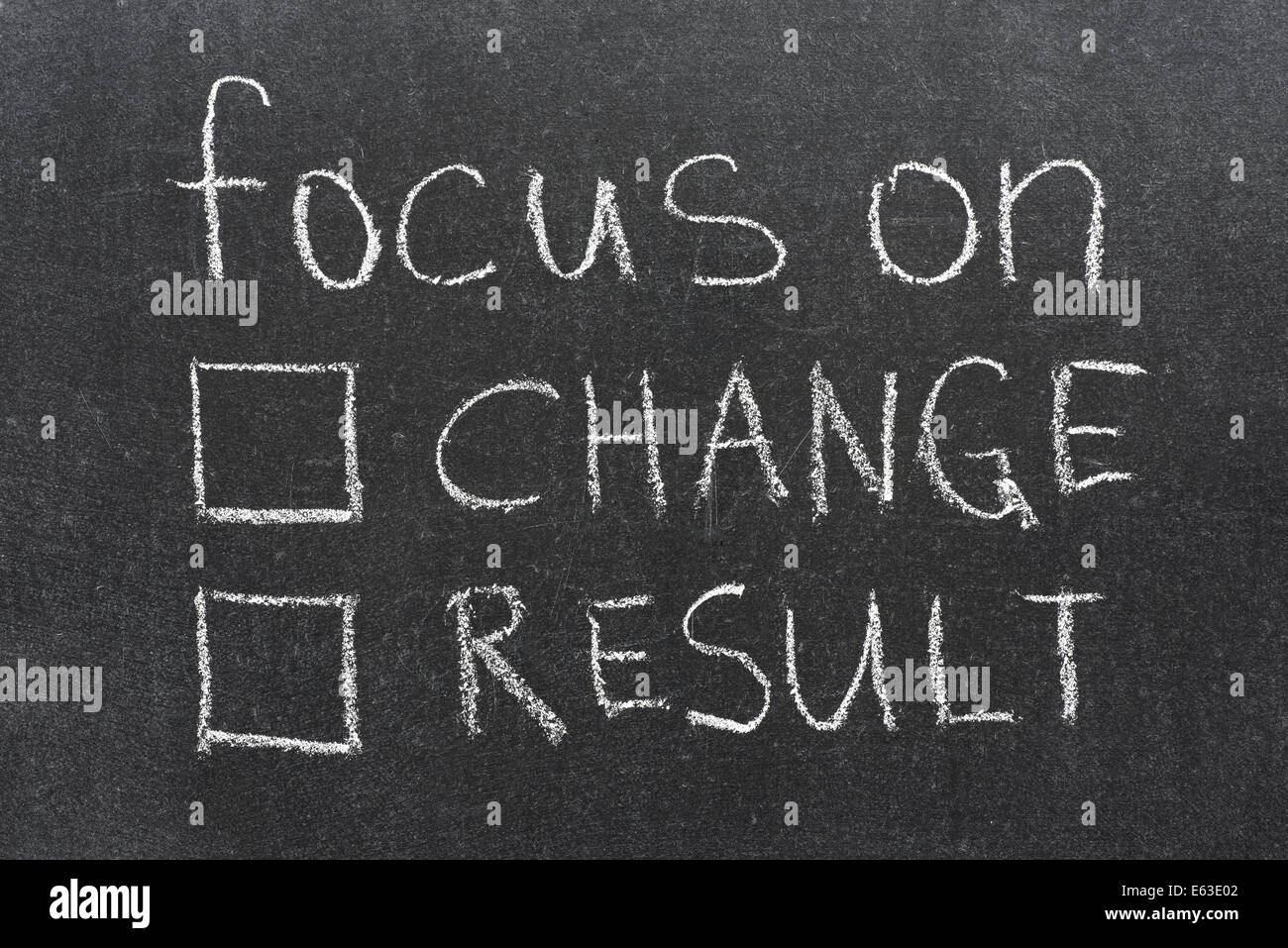 focus on change or result phrase with two empty check-boxes handwritten ...