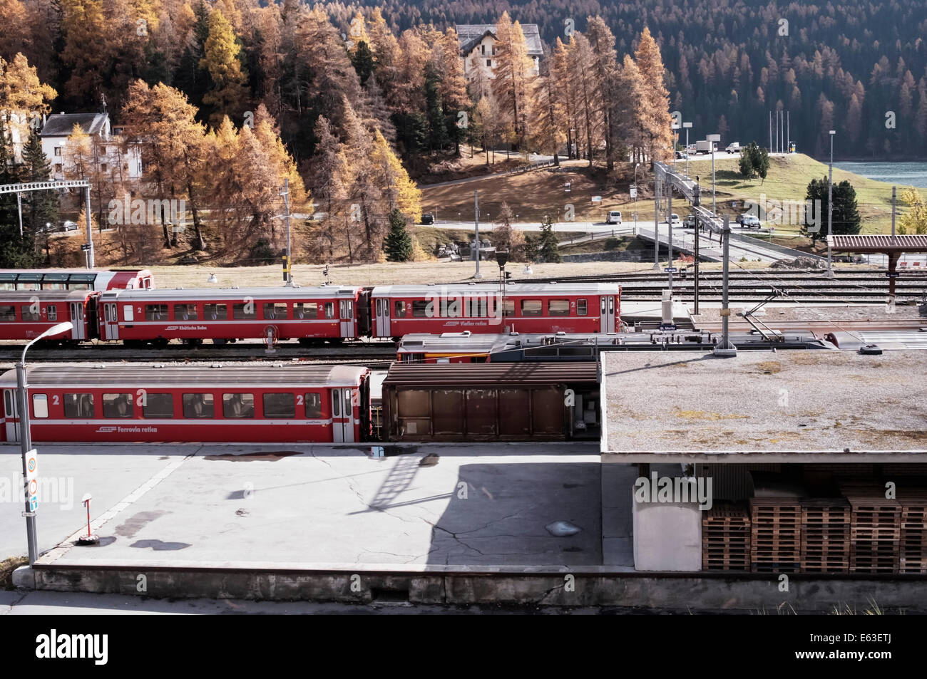 st. moritz bad train station with background forest Stock Photo - Alamy