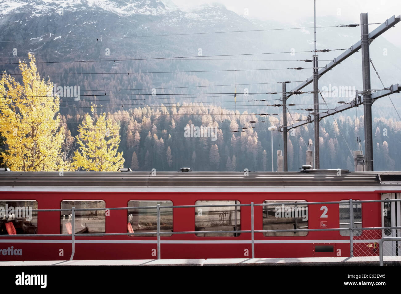 swiss railroad red train wagon at station Stock Photo - Alamy