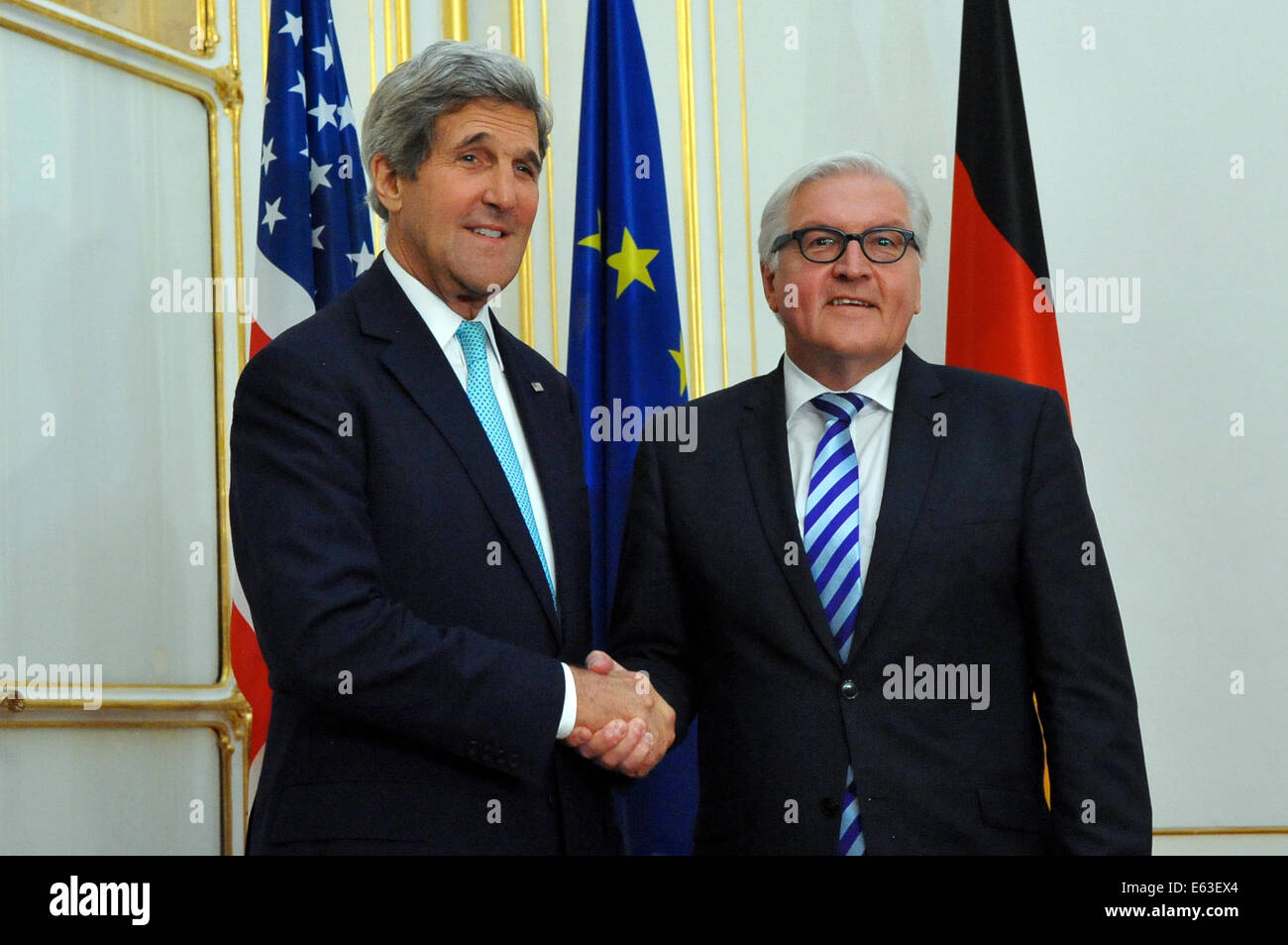 U.S. Secretary of State John Kerry shakes hands with German Foreign ...