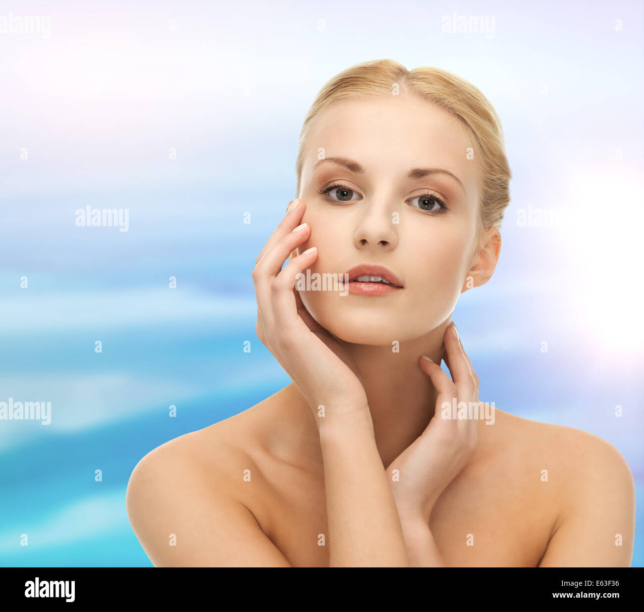 woman touching her face skin Stock Photo - Alamy