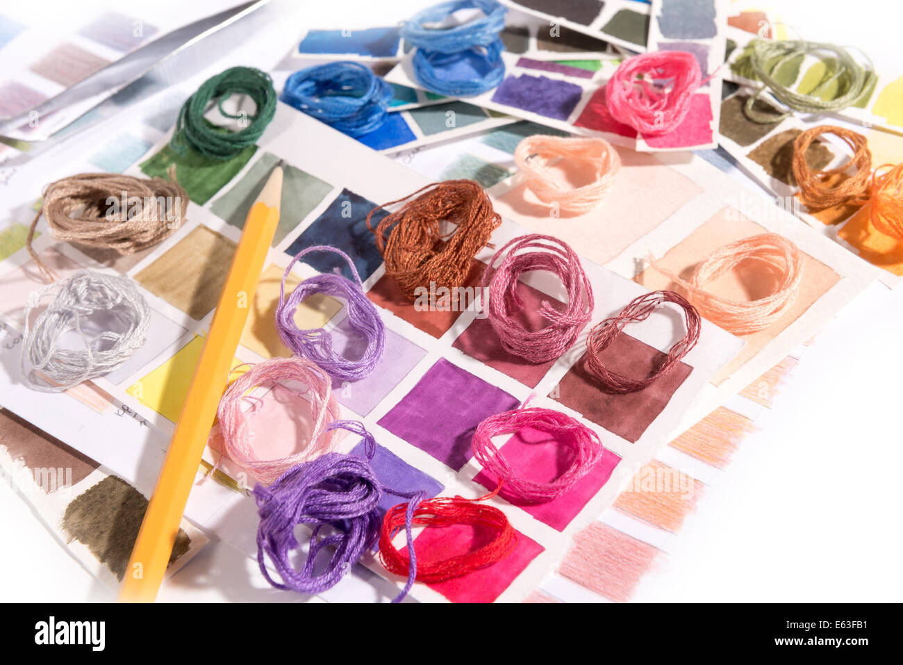 Needlework. Embroidery. Match colors of thread on the sketches of the ...