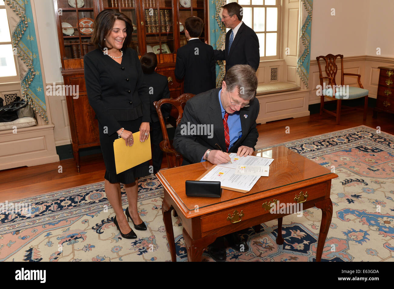 Under Secretary for Management Patrick F. Kennedy signs the appointment ...