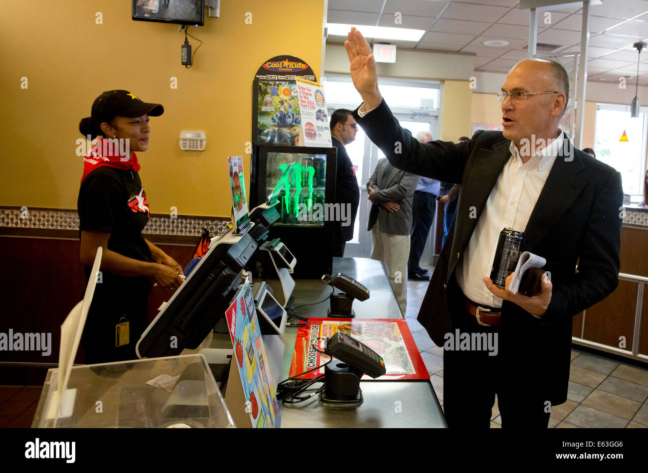 Fast-food restaurant chain Carl's Jr. CEO Andrew Puzder, greets ...