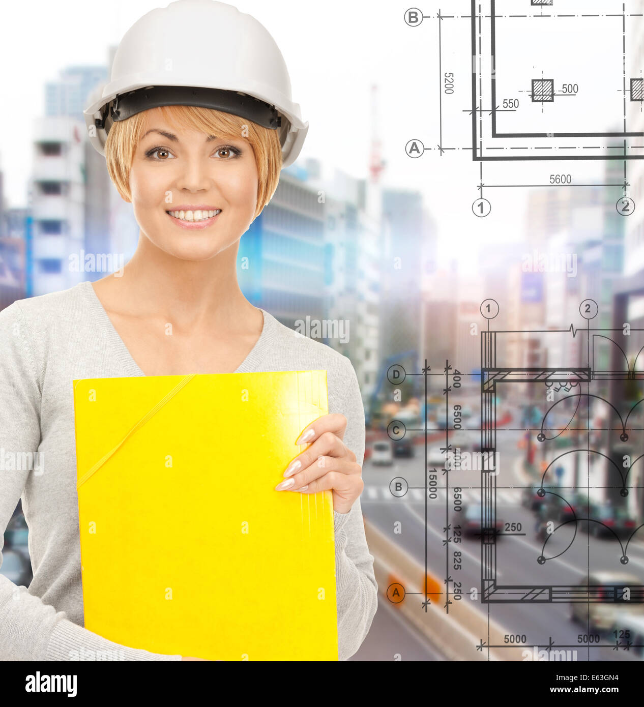 Female contractor in helmet folder hi-res stock photography and images ...