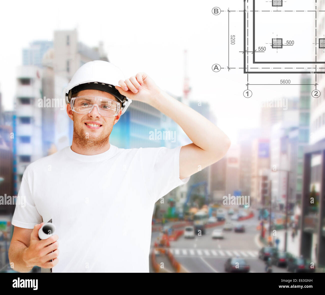 male architect in helmet with blueprint Stock Photo - Alamy