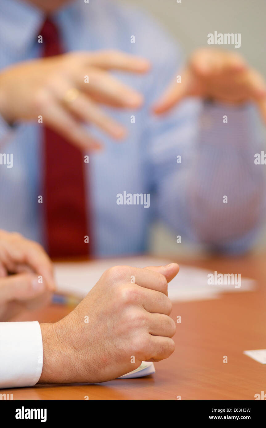 Hands during a meeting expressing what is being said with body language ...