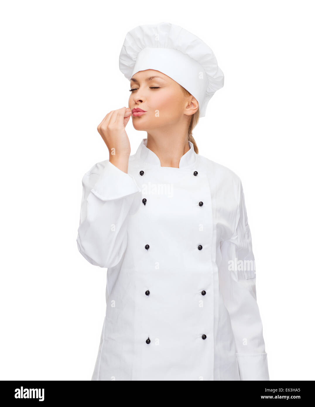 smiling female chef showing delicious sign Stock Photo - Alamy