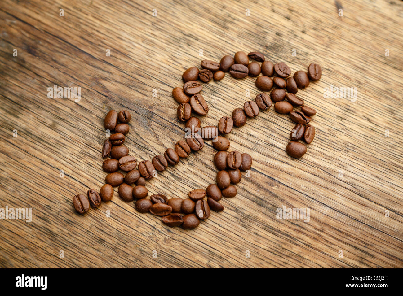 Coffee dollar sign created from coffee beans Stock Photo - Alamy
