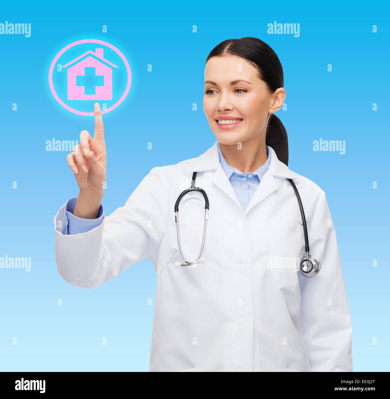 smiling female doctor pointing to hospital sign Stock Photo - Alamy