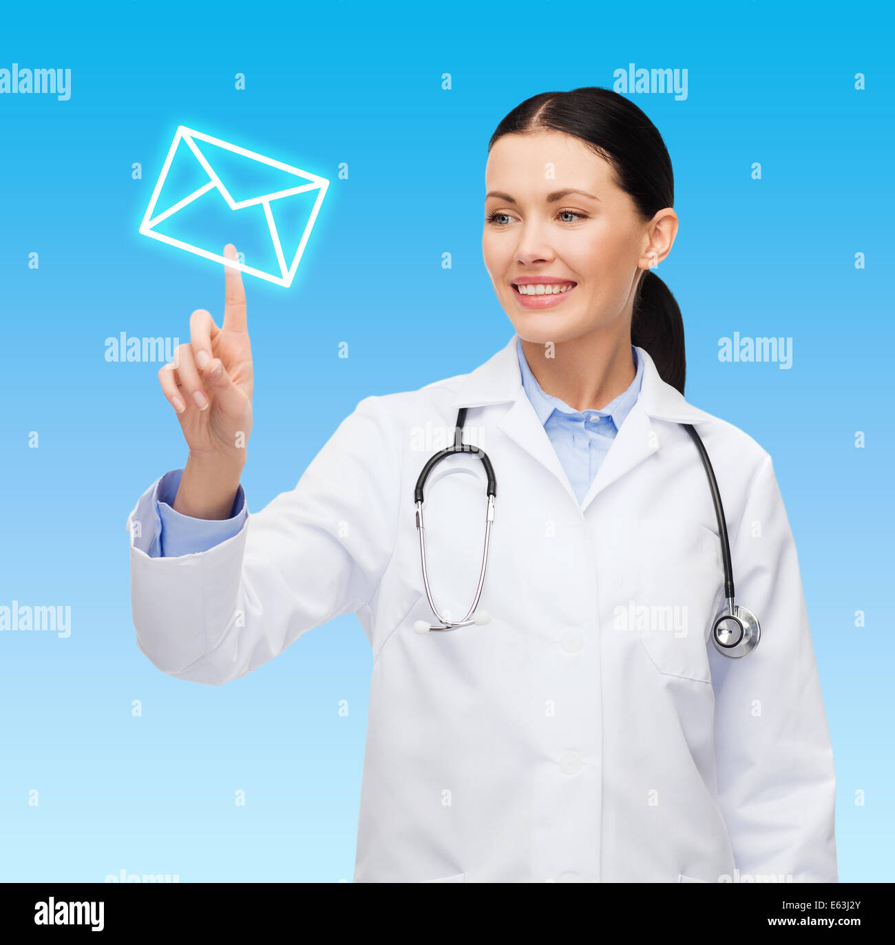 smiling female doctor pointing to envelope Stock Photo - Alamy