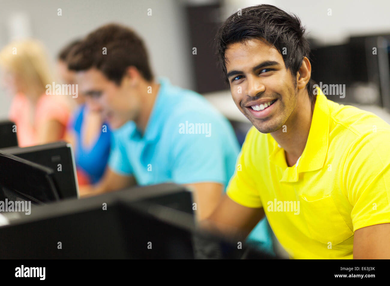 handsome university student in computer room Stock Photo - Alamy