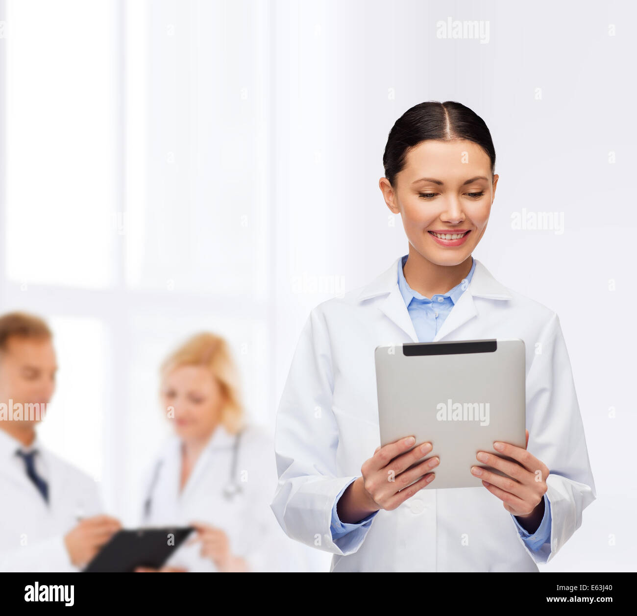 female doctor without stethoscope and tablet pc Stock Photo - Alamy